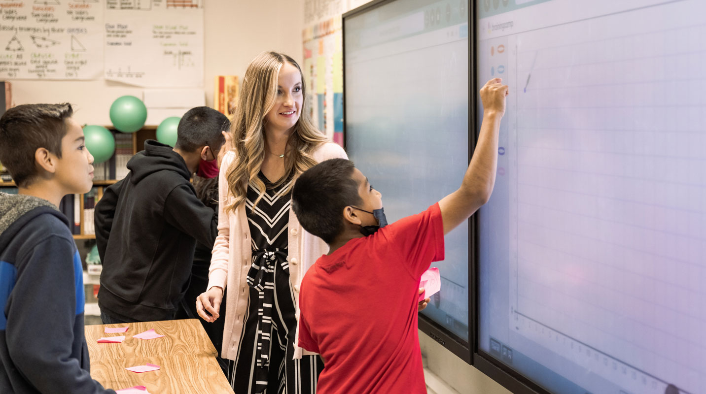 Interactive whiteboards promote learning, collaboration at Hogg New ...
